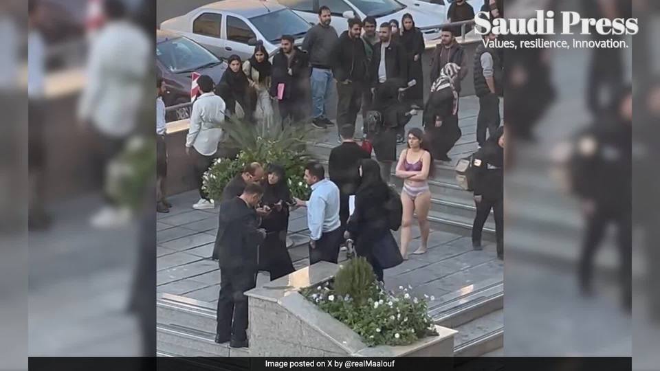 Woman Protests Strict Dress Code at Iranian University - Saudi Press