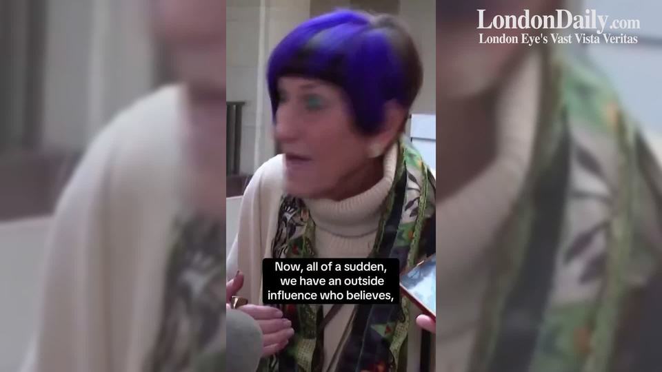 A Democratic congresswoman with blue and black hair is having a ...